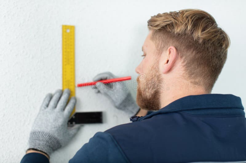 Builder Uses Set-square Against Wall Stock Image - Image of craftsman ...