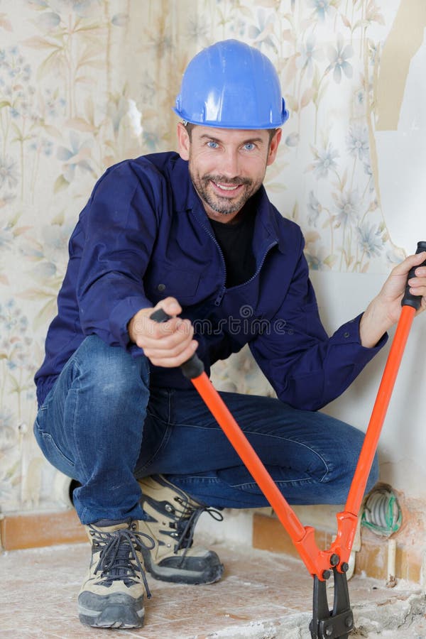 Builder Using Bolt Croppers Stock Photo - Image of full, blue: 315973124