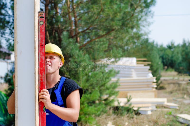 Builder Using a Builders Level Stock Photo - Image of checking ...