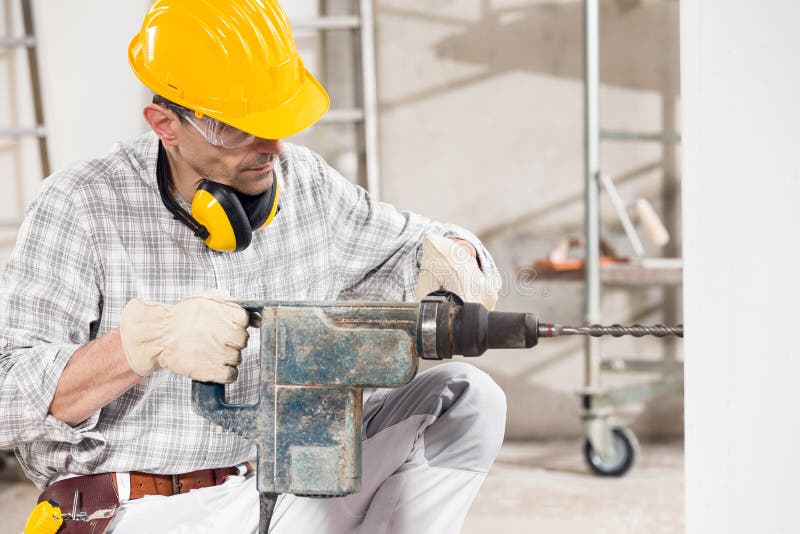 Builder Using a Handheld Power Drill Stock Image - Image of ...