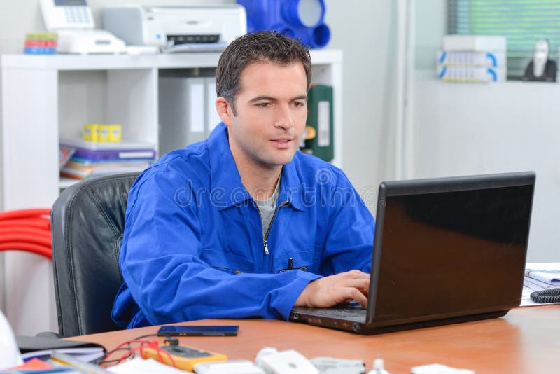 Builder Using Laptop Computer Stock Photo - Image of engineer, handyman ...