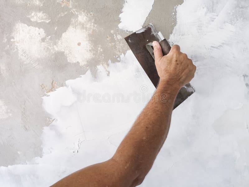 Builder Using Plastering Tool for Finishing Old Wall Stock Image ...