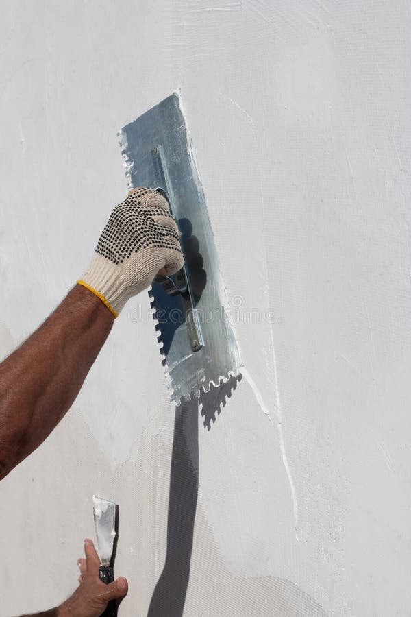 Builder Using Plastering Tool for Finishing Wall Stock Image - Image of ...