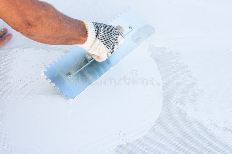 Builder Using Plastering Tool for Finishing Wall and Floor Stock Image ...