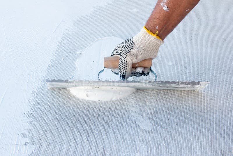 Builder Using Plastering Tool for Finishing Wall and Floor Stock Image ...