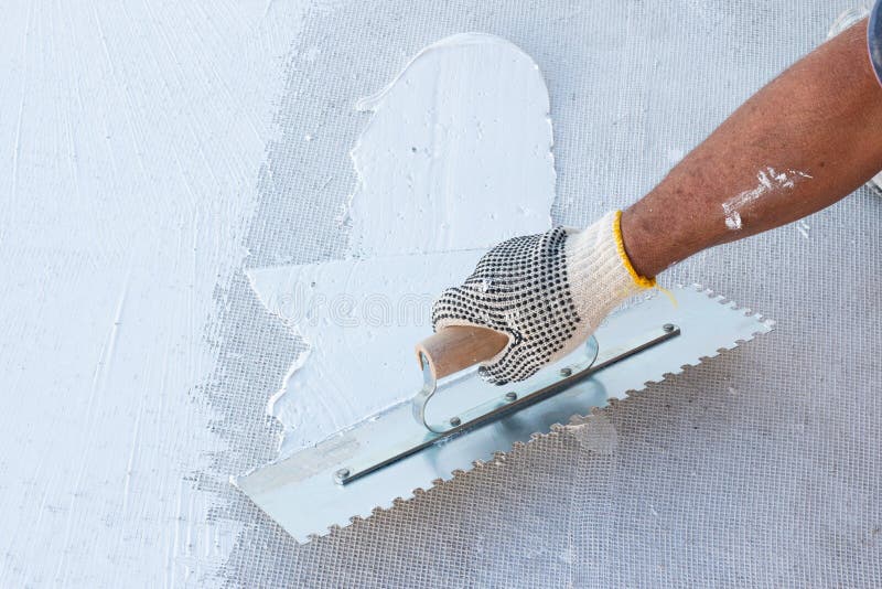 Builder Using Plastering Tool for Finishing Wall and Floor Stock Image ...