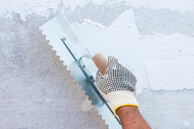Builder Using Plastering Tool for Finishing Wall and Floor Stock Image ...