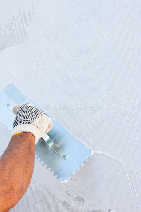 Builder Using Plastering Tool for Finishing Wall and Floor Stock Image ...