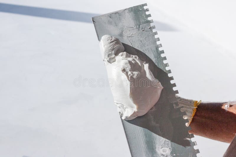 Builder Using Plastering Tool for Finishing Wall and Floor Stock Image ...