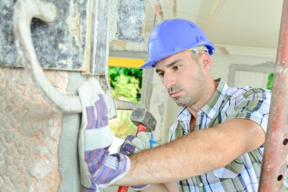 Builder Using Sledge Hammer Stock Image - Image of powerful, punch ...