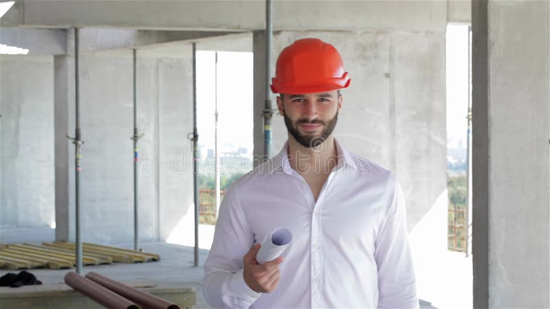 Builder Walking with Set of Plans Under His Arm Stock Video - Video of ...