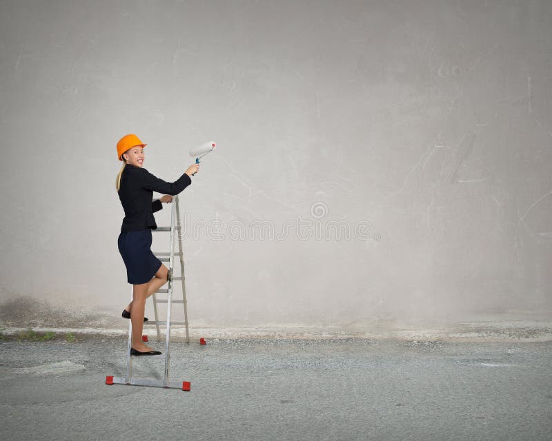 Builder Woman on Ladder . Mixed Media Stock Photo - Image of urban ...