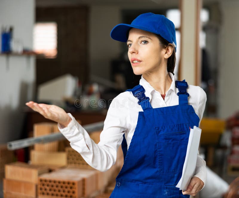 Builder Woman Pointing Hand at Completed Room Renovation Stock Image ...