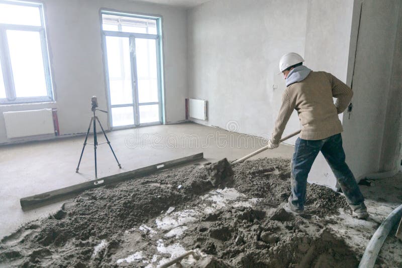 A Builder in Work Clothes is Doing His Job Stock Image - Image of ...