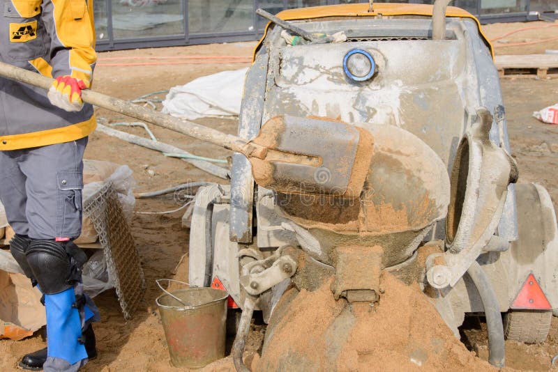 Builder in Work Clothes Prepares Tools and Materials Stock Image ...