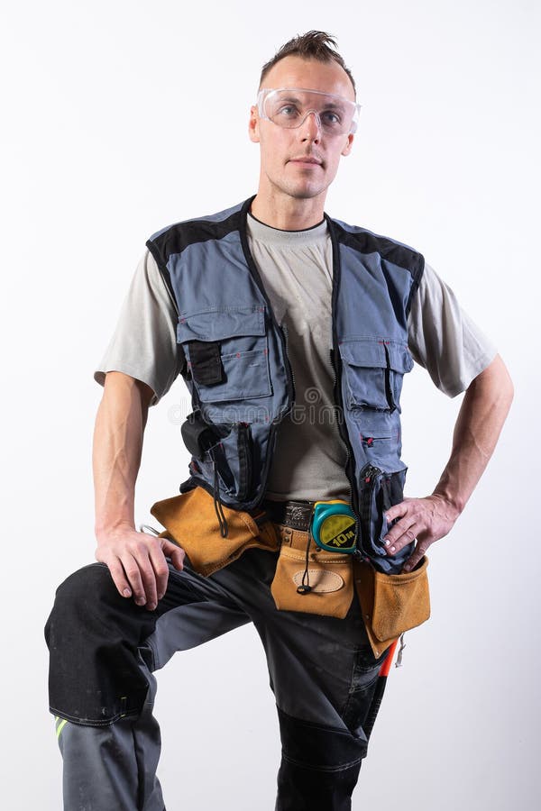 Builder in Work Clothes with a Tool Stock Image - Image of belt ...