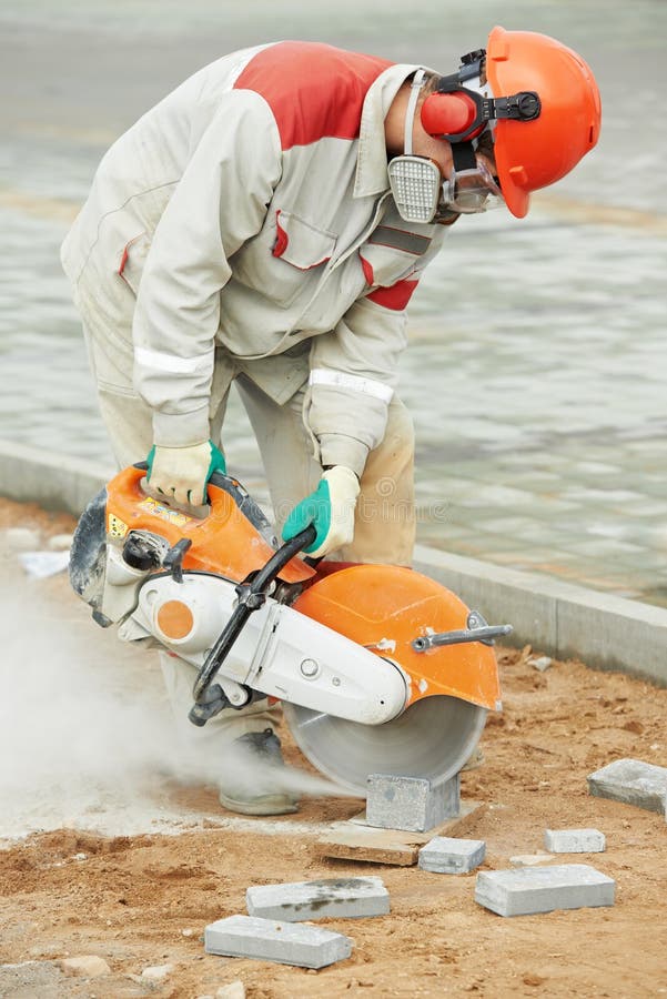 Builder Worker Cutting Curb with Disc Saw Stock Photo - Image of ...