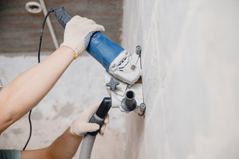 Builder Man Cutting Electrical Chase in Concrete Wall with Groove ...