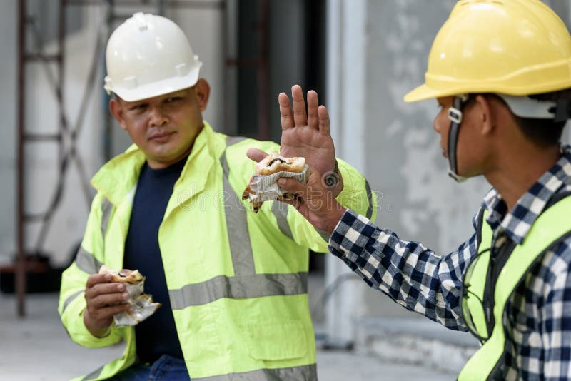 Builder Worker Eats at Construction Site Stock Photo - Image of labor ...