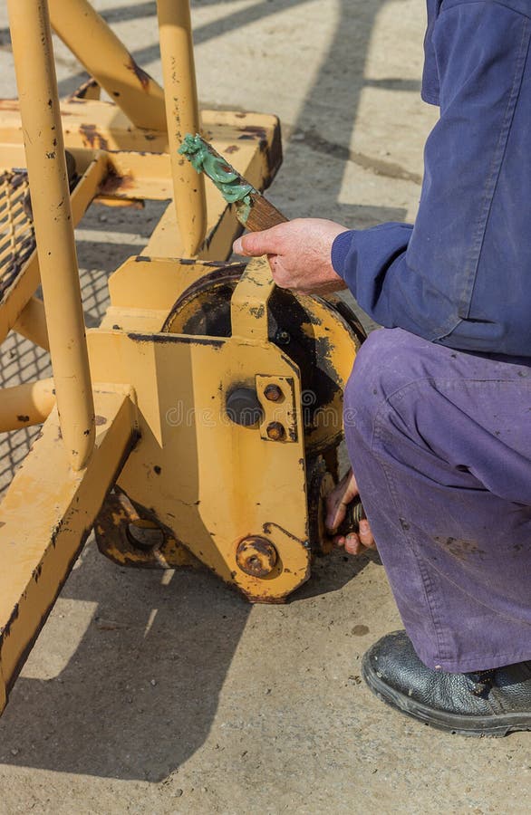 Builder Worker Greasing Parts of the Crane Stock Photo - Image of black ...