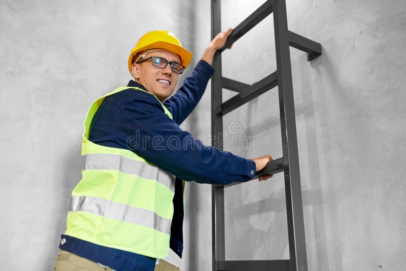 Builder or Worker in Helmet Climbing Ladder Stock Image - Image of ...