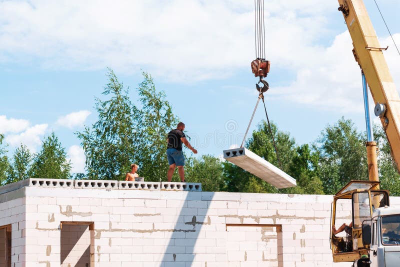 Builder Worker Installing Concrete Floor Slab Panel at Building ...