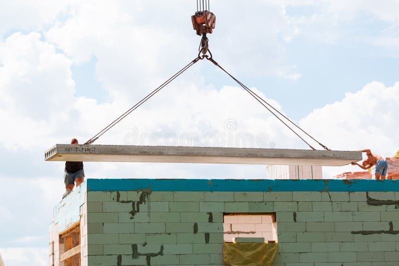 Builder Worker Installing Concrete Floor Slab Panel at Building ...