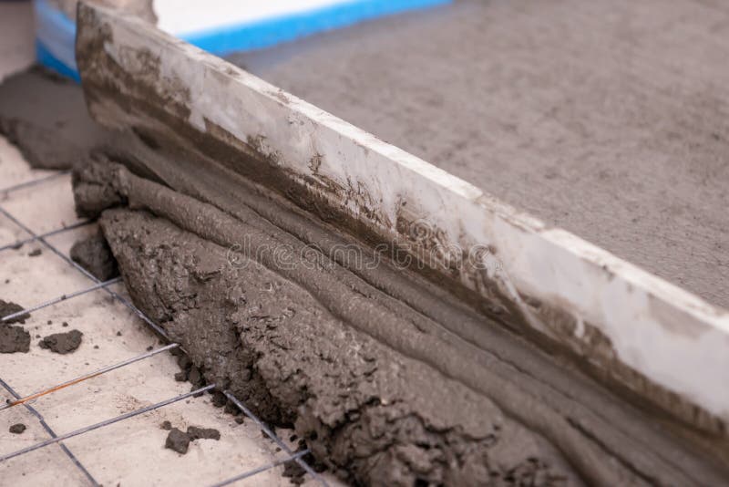 Builder Worker Plastering Concrete at Floor of House Construction Stock ...
