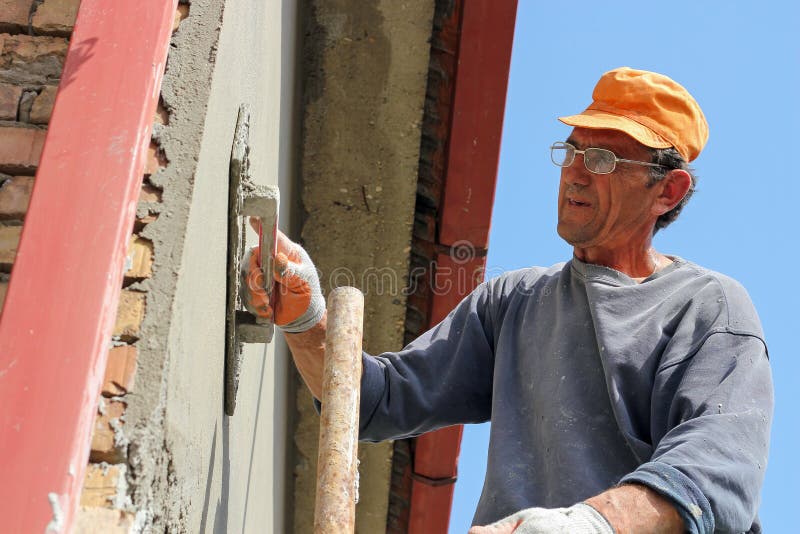 Builder Worker at Plastering Facade Work Stock Photo - Image of ...
