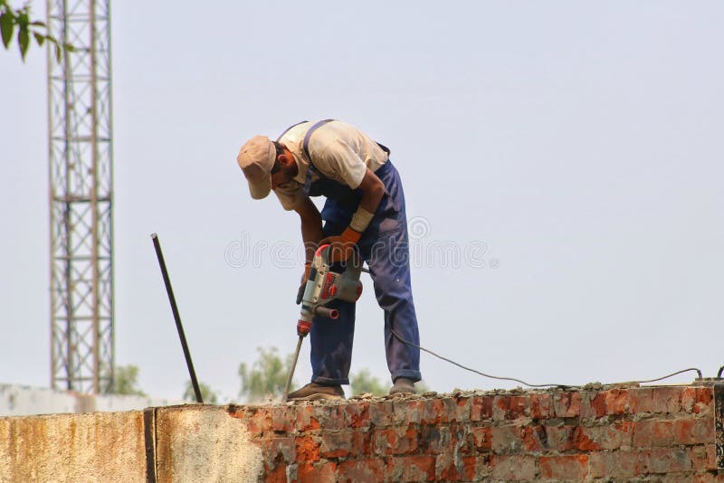 Builder Worker with Pneumatic Hammer Drill Perforator Equipment Making ...