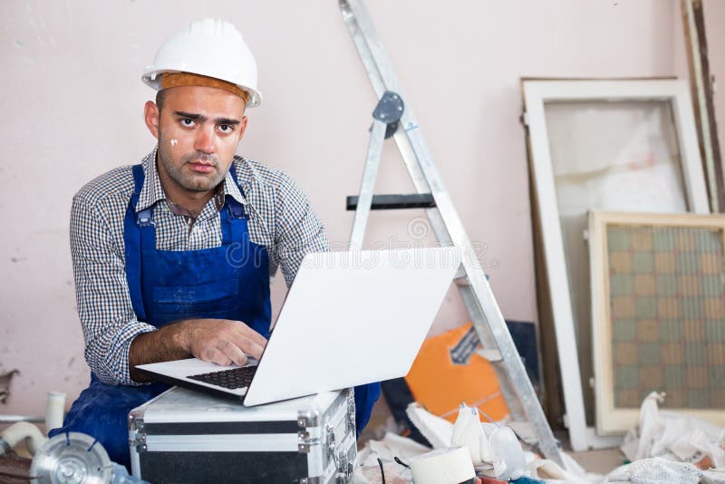 Builder is Working at the Computer Stock Image - Image of 3040, helmet ...