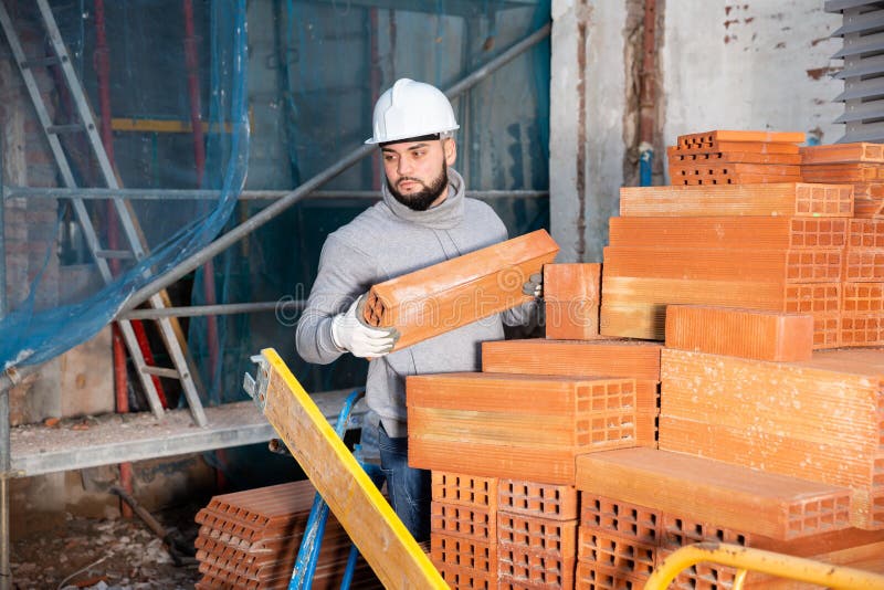 Builder Working with Red Brick Stock Photo - Image of installation ...