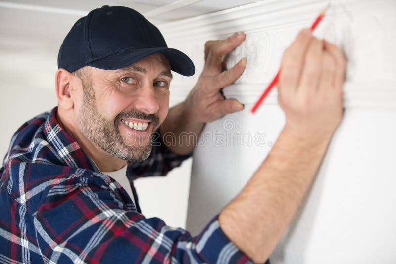 Builder Working on Wall Cornicing Stock Image - Image of inside ...