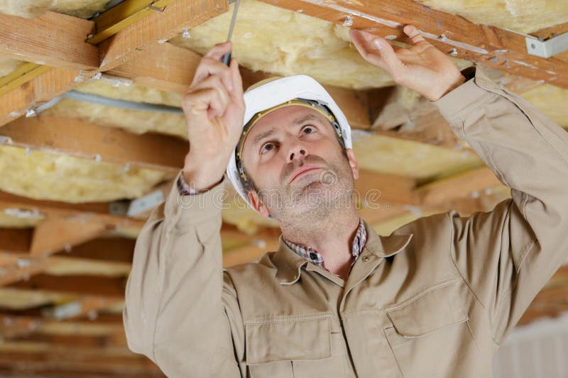 Builder Working on Wood Ceiling Stock Image - Image of laborer ...