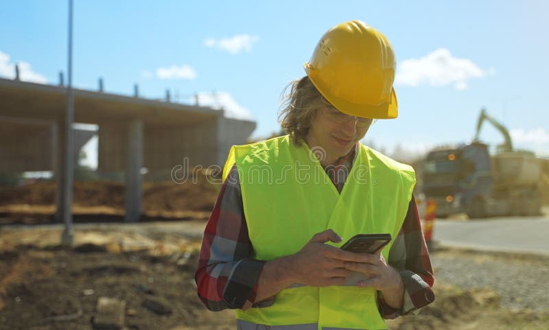 Builder Writes Sms on Smartphone Stock Image - Image of protection ...