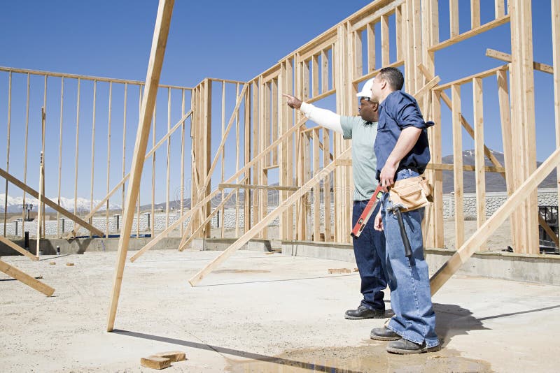 Builders on Construction Site Stock Image - Image of black, designer ...