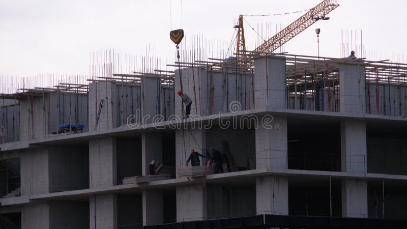 Builders Load a Collapsible Tower Crane Onto a Truck. Stock Footage ...