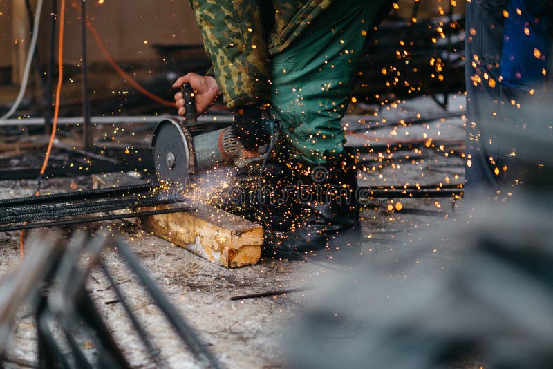 Builders at Construction Site Make Engineering Calculations and Cut ...