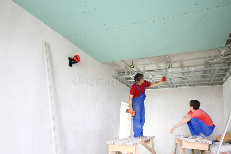 The Builders Install the Ceiling Profile in the Stock Image - Image of ...