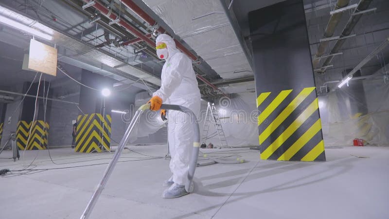 Builder Works Concrete Floor with Special Equipment. Concrete Floor ...