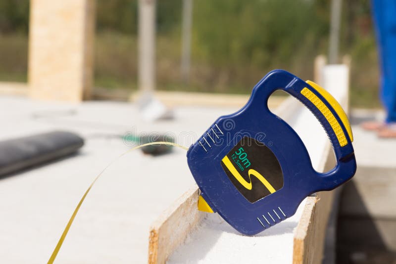 Builders Retractable Tape Measure on Site Stock Photo - Image of ...
