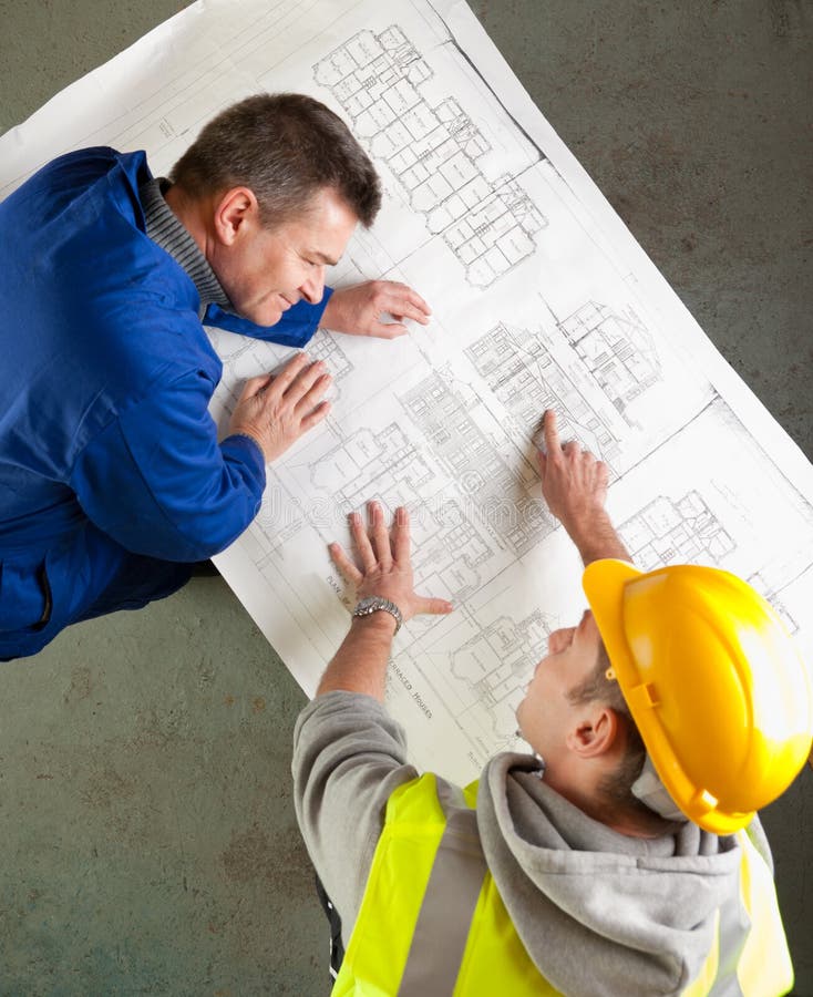 Builders Share Humor about Blueprints Stock Image - Image of hard ...
