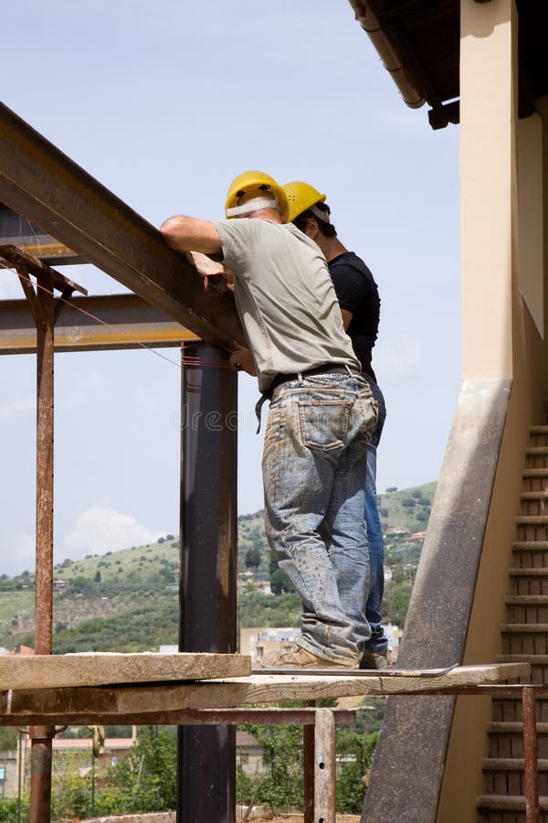 Builders at work stock photo. Image of manual, building - 35691826