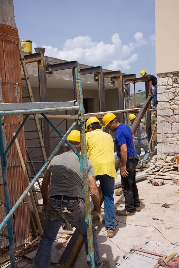 Builders at work stock image. Image of house, brick, builders - 35691673