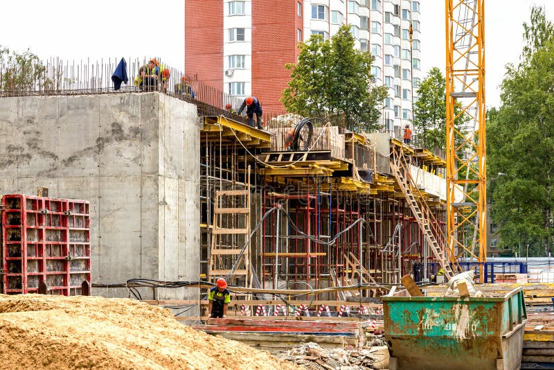 Builders Work on the Construction of a Residential Building Editorial ...