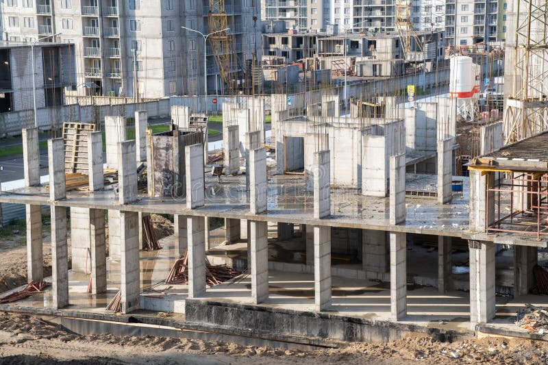 Builders Work on Large Construction Sites, and There are Many Cranes ...