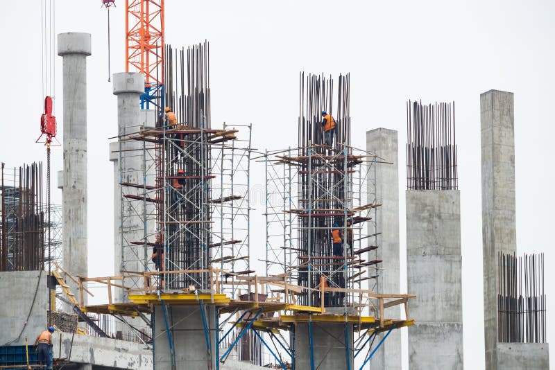 Builders Working on the Construction of a Large Building Stock Photo ...