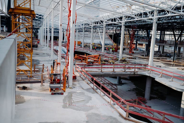 Builders Working on Structural Development at an Active Construction ...