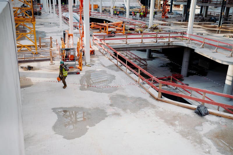 Builders Working on Structural Development at an Active Construction ...