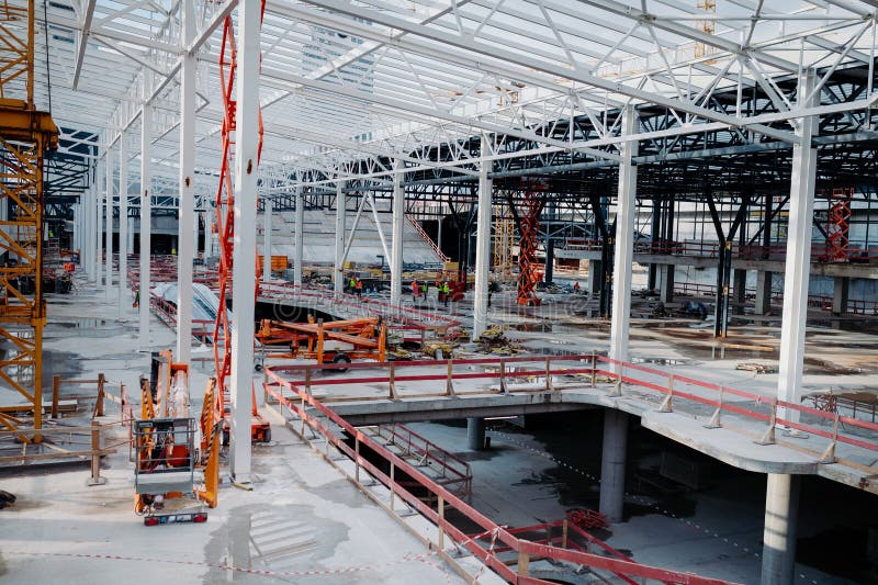 Builders Working on Structural Development at an Active Construction ...